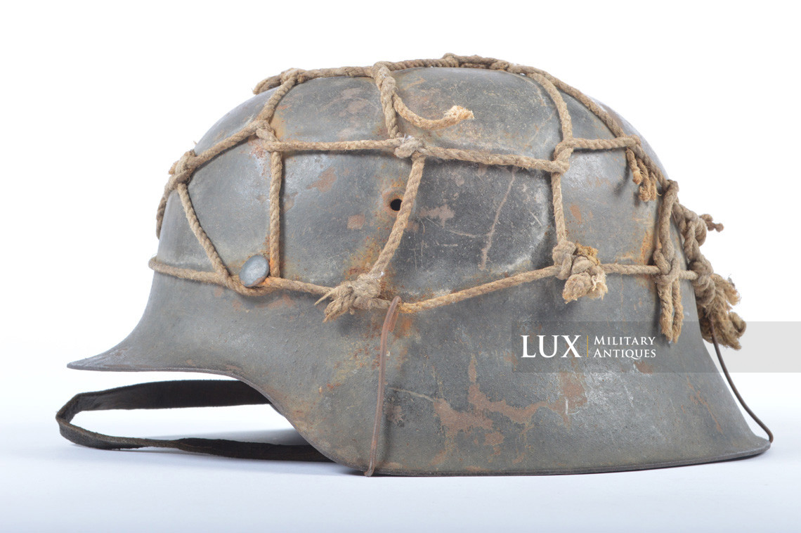 M42 netted German combat helmet, « ckl66